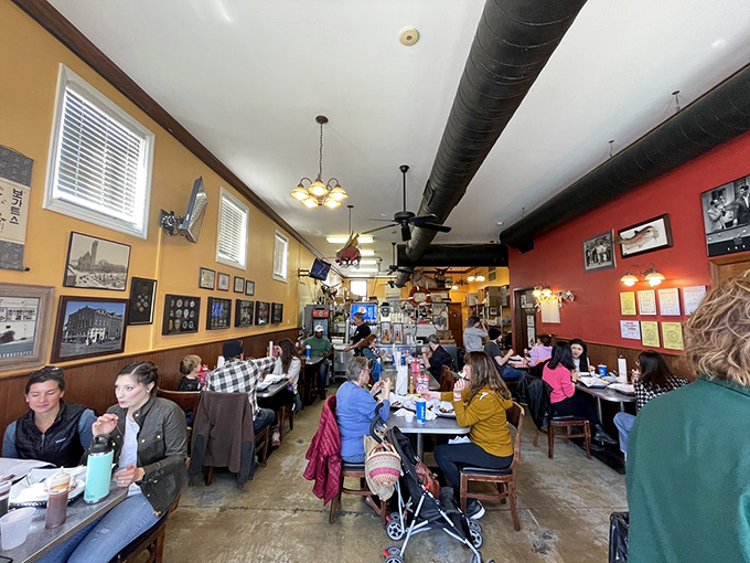 Where barbecue dreams come true. The narrow, bustling interior of Bogart's showcases yellow and red walls adorned with local history, while ceiling fans circulate that intoxicating smoky perfume.