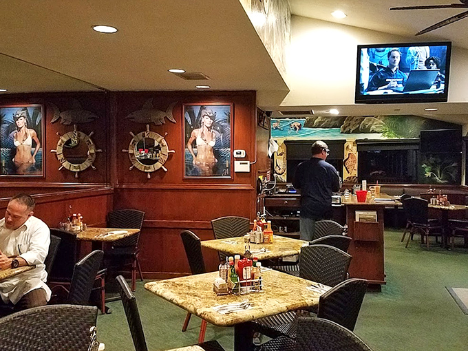 Nautical charm meets breakfast haven inside Cappy's, where ship wheels and maritime art create the perfect backdrop for morning feasting.