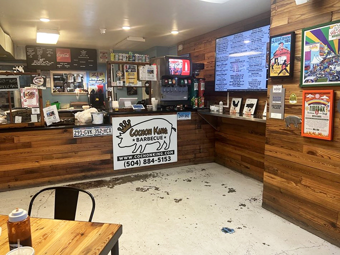 The no-frills interior keeps the focus where it belongs: on the wood-paneled counter where meat magic happens.