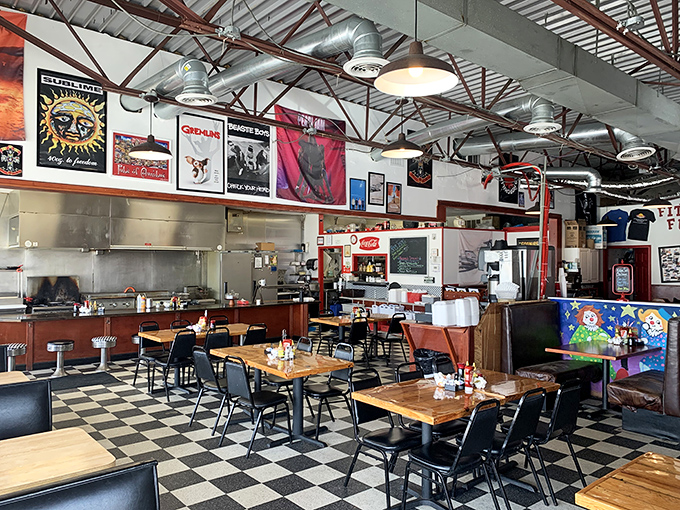 Classic checkered floors and concert posters create that perfect diner atmosphere&mdash;where nostalgia meets comfort in every corner.