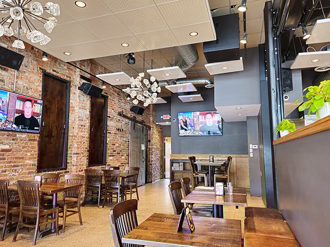 Exposed brick walls meet modern lighting fixtures in this stylish interior that says, "Yes, we're serious about food, but we don't take ourselves too seriously."