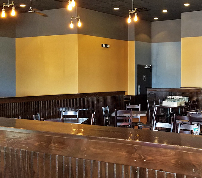 Warm yellow walls and Edison bulbs create that perfect "I could linger here all morning" ambiance that separates great breakfast spots from mere coffee stops.