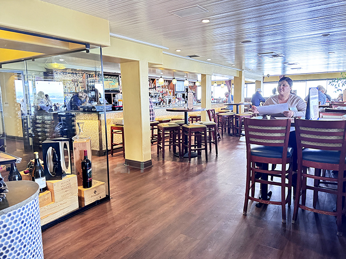 Inside, warm wood tones and nautical touches create that perfect "fancy but not too fancy" vibe where both celebration dinners and Tuesday lunches feel right at home.