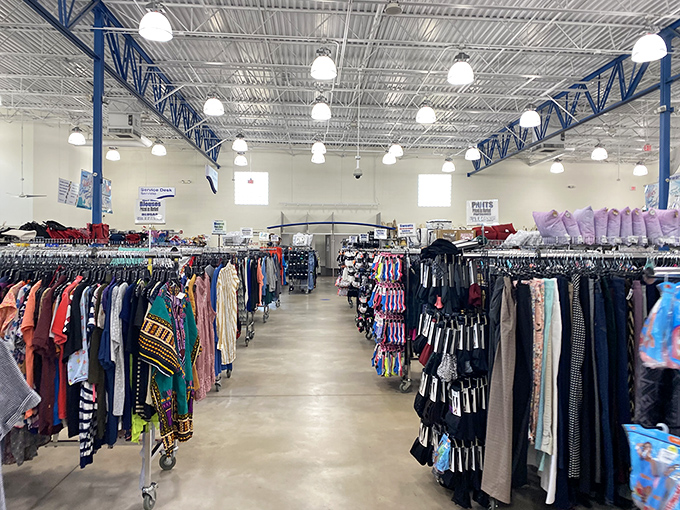 Rows upon rows of clothing create a textile landscape where yesterday's fashion finds tomorrow's enthusiast. The thrill of the hunt begins here.