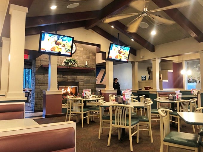 Stone fireplace, wooden beams, and comfortable seating&mdash;this isn't just dining, it's a warm embrace after a long day. The kind of place where memories are made between bites.