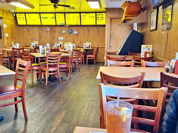 Wood paneling and straightforward seating tell you everything you need to know—this place prioritizes what's on your plate, not what's on the walls.