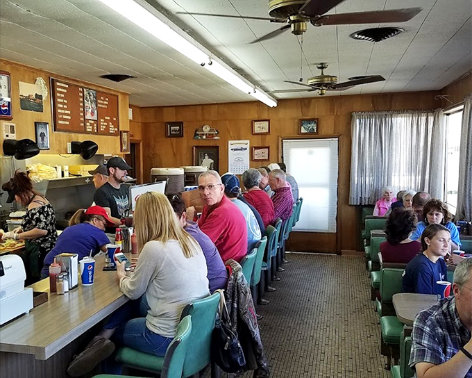 Counter seating that tells stories&mdash;where strangers become friends and regulars become family, all united by the pursuit of burger perfection.
