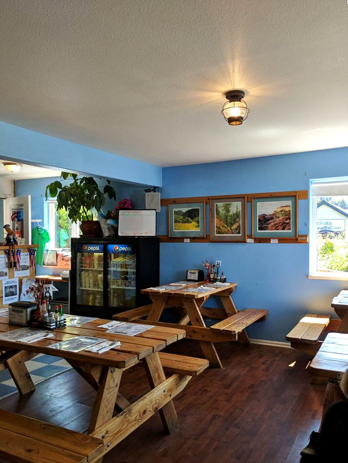 Picnic tables indoors? Genius! The blue walls and nautical lighting create a casual vibe where the focus stays squarely on what matters&mdash;the seafood.