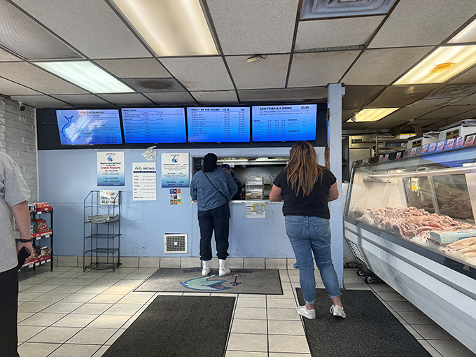 Simple counter, digital menus, and that glorious seafood case &ndash; everything you need, nothing you don't.