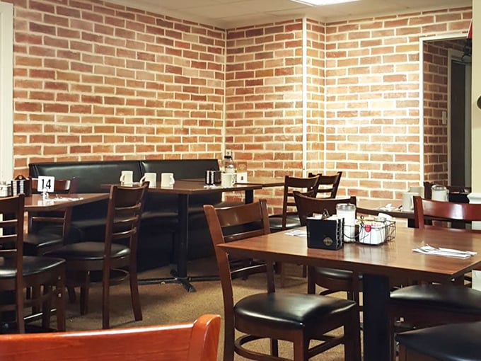 Exposed brick walls and simple wooden tables create that rare atmosphere money can't buy &ndash; genuine small-town comfort without pretense.