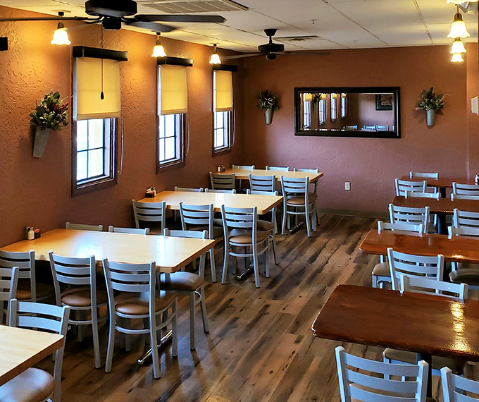 Simple wooden tables await diners in a warm, earthy interior where the focus is squarely where it should be&mdash;on the food that's about to arrive.