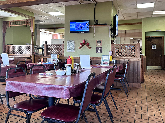Wood paneling, lattice dividers, and burgundy tablecloths&mdash;this dining room hasn't changed since Reagan was president, and that's precisely its charm.