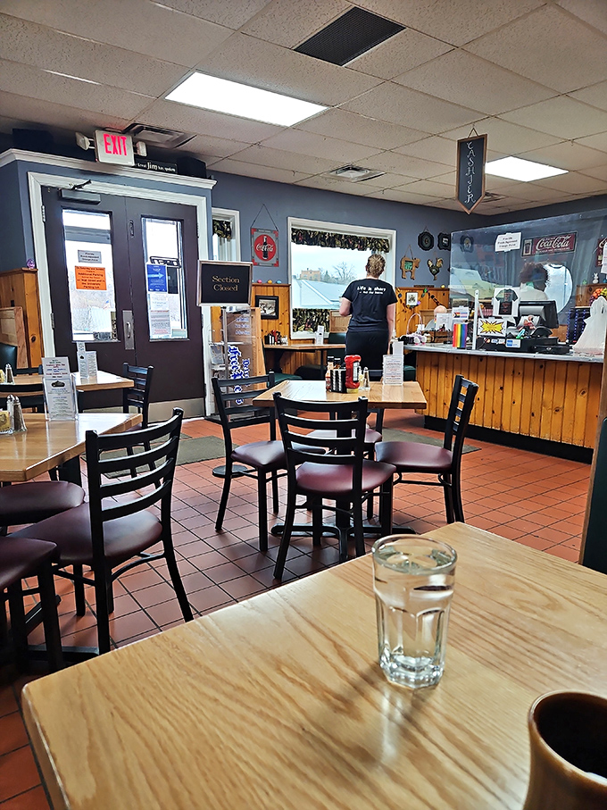 Inside, wood paneling and classic diner charm create the perfect backdrop for morning conversations and coffee refills.