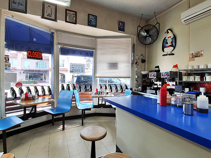 Inside, the penguin theme isn't subtle&mdash;it's a full-blown obsession that somehow makes your coffee taste better and your morning brighter.