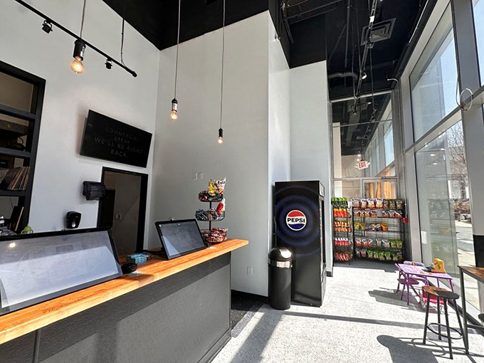 Minimalism meets maximum flavor. The clean interior with its pendant lights and wooden counter says, "We're serious about sandwiches, not d&eacute;cor."