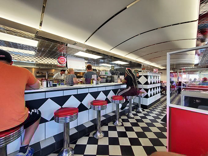 The classic black and white checkered floor leads to paradise&mdash;one where red vinyl stools have witnessed thousands of first dates, business deals, and life-changing dessert decisions.