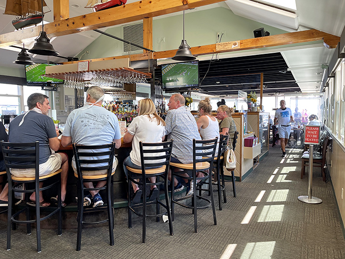 The bar area strikes that perfect balance: nautical enough to remind you where your dinner came from, comfortable enough to make you stay awhile.