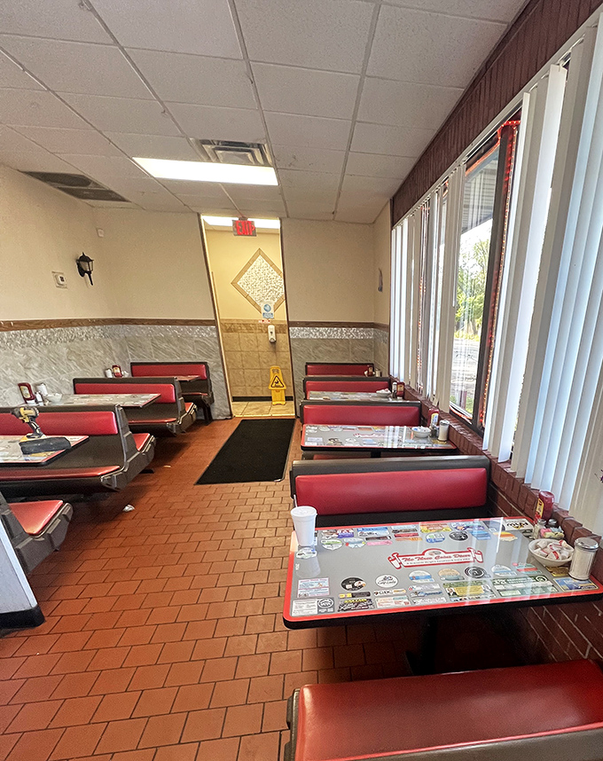 Classic red vinyl booths and terra cotta floors &ndash; where conversations have flowed as freely as the coffee for decades. The diner equivalent of a warm hug.