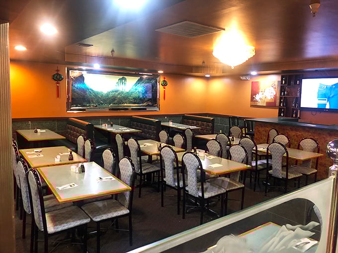 The dining room's crystal chandelier adds unexpected elegance, like finding a tuxedo at a tailgate party.