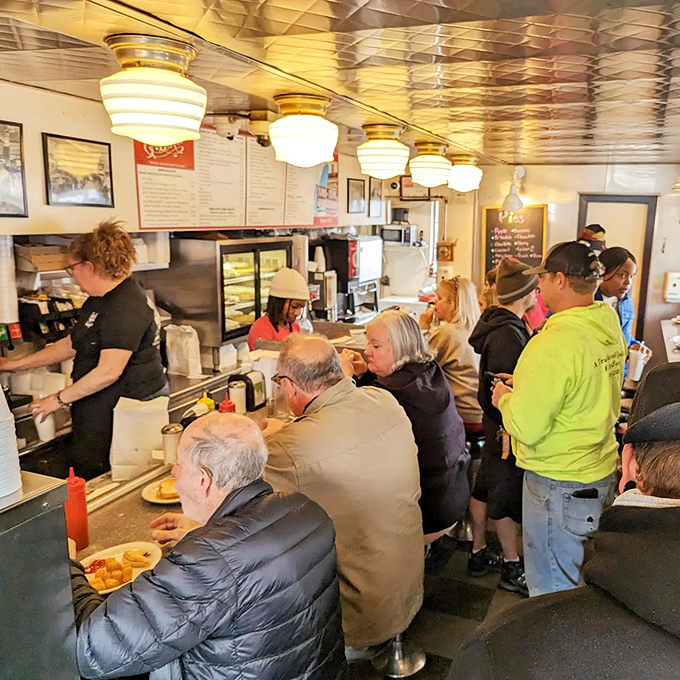 Democracy at the counter. Locals from all walks of life rub elbows at Town Topic's stools, united by the universal language of great diner food.