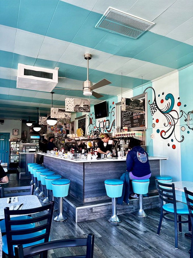 Step inside and the turquoise wonderland transports you to a time when diners were the heart of American mornings, not just Instagram backdrops.