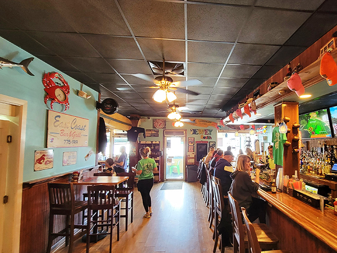 Inside Woody's, coastal blue walls adorned with maritime treasures create the perfect backdrop for seafood magic to unfold.