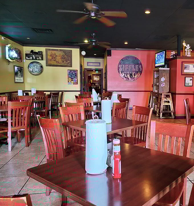 Red walls, wooden chairs, and ceiling fans create that perfect "come as you are" vibe where napkins aren't just provided&mdash;they're absolutely necessary.