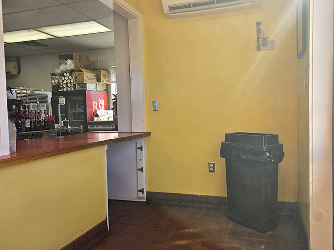 Simple yellow walls and no-nonsense ordering counter&mdash;because when the food is this good, who needs fancy decor?