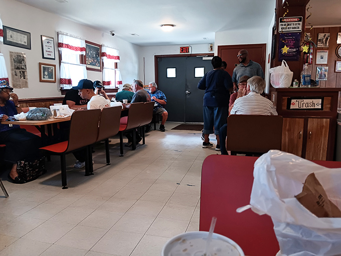 Simple dining room, serious business &ndash; where ceiling fans and wood paneling create the perfect backdrop for barbecue bliss.