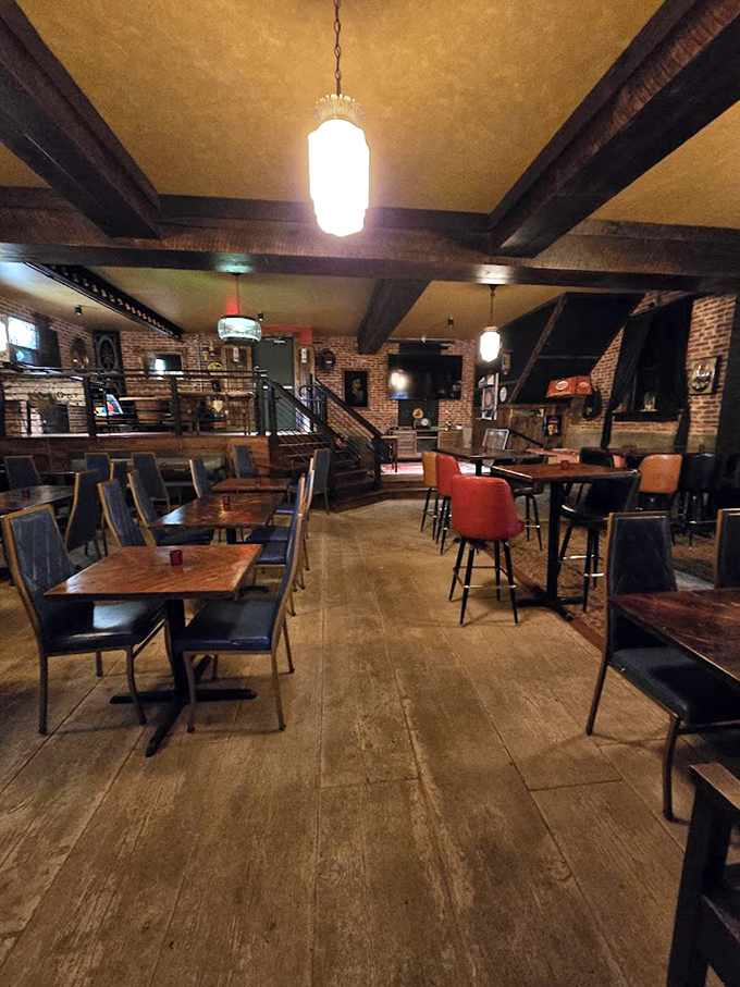 Exposed beams and brick walls create the kind of atmosphere where conversations flow as smoothly as the wine.