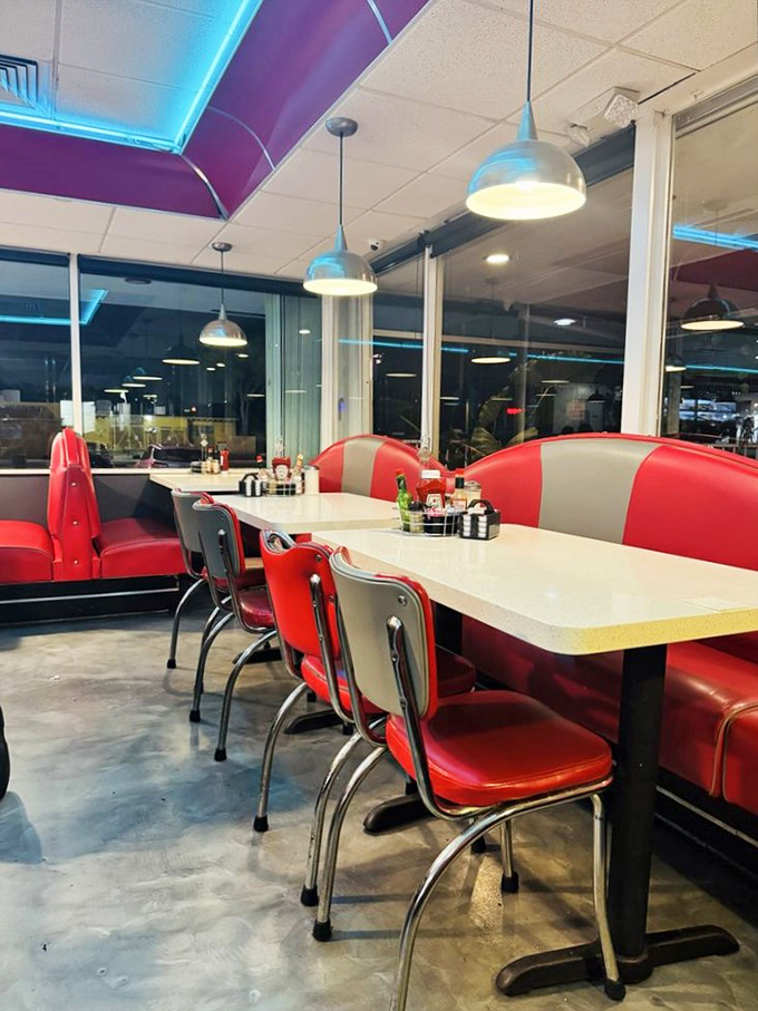 Those cherry-red booths aren't just seating&mdash;they're front-row tickets to Fort Lauderdale's longest-running comfort food show.