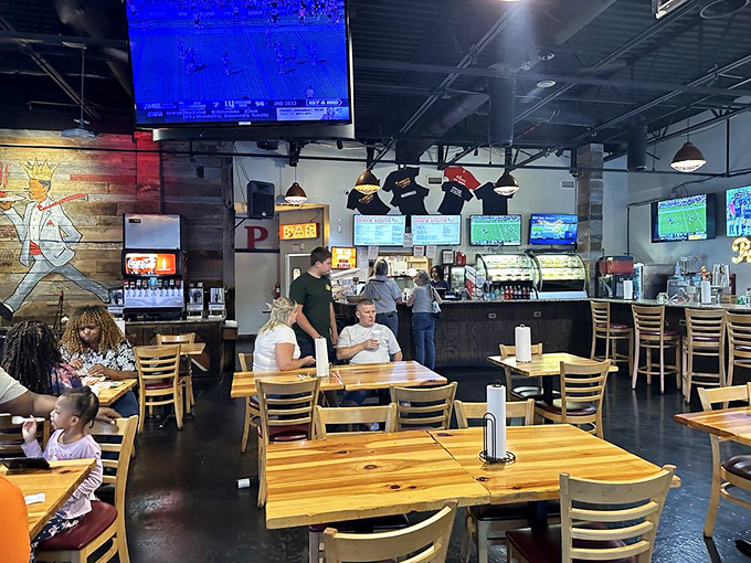 The modern interior balances casual comfort with serious chicken business&mdash;wooden tables that have witnessed countless first-timers underestimating the heat scale.