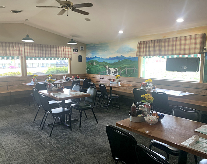 That pastoral mural watches over diners like a benevolent bovine guardian of comfort food traditions.