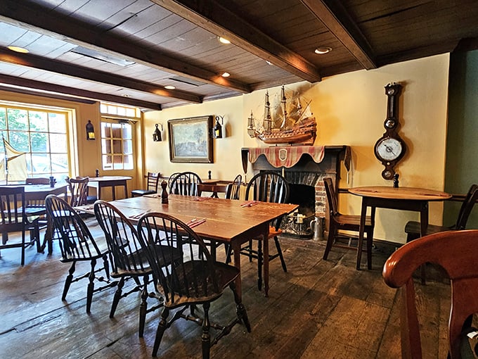 Dark wood beams and flickering candlelight create an atmosphere that would make any colonist feel right at home.