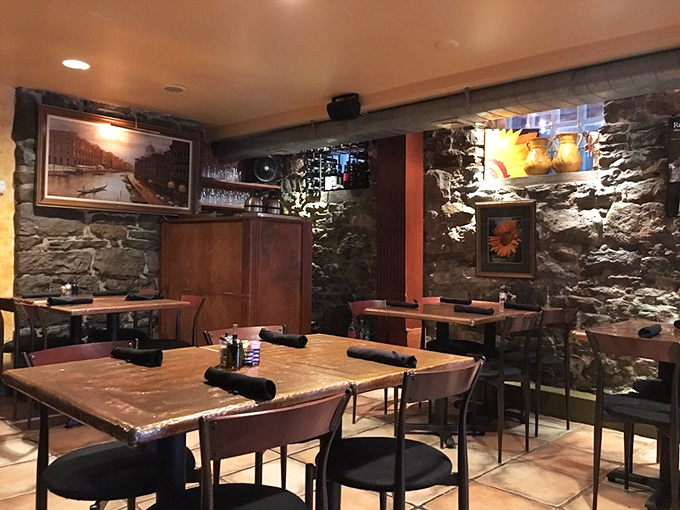 Stone walls that could tell stories, if walls could talk about perfect pasta and wine pairings.