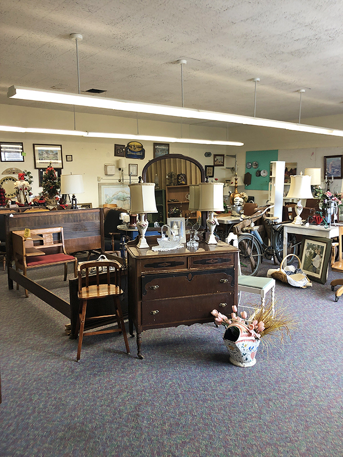 A classroom transformed into a time capsule where every desk, lamp, and chair tells stories of bygone eras.