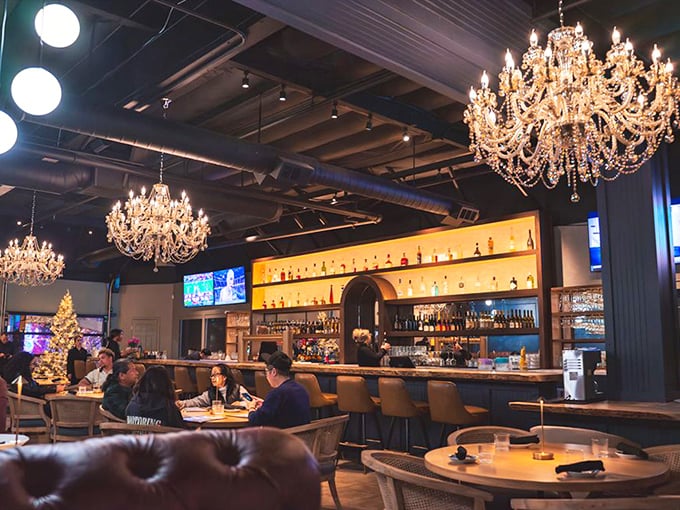 Crystal chandeliers cast a golden glow over diners discovering that elegance and comfort can coexist beautifully.