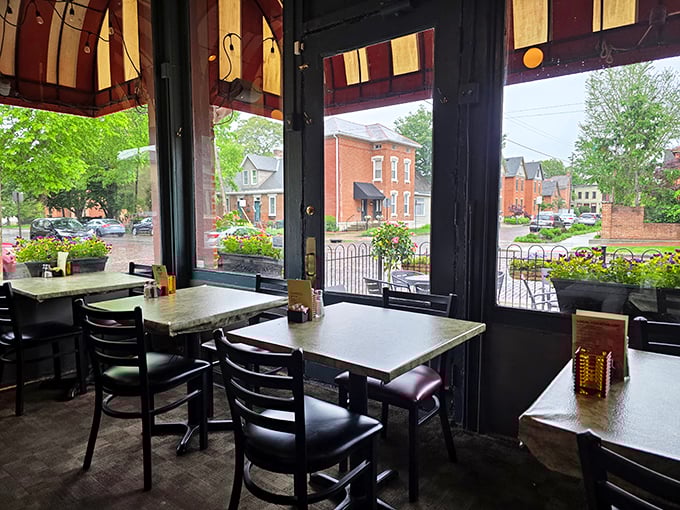 Windows frame the neighborhood like postcards while you contemplate which comfort food masterpiece to order first.