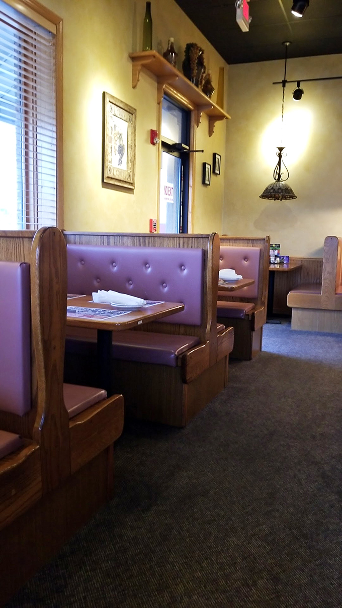 Cozy burgundy booths invite you to settle in for the long haul. This isn't fast food&mdash;this is slow down and savor food.