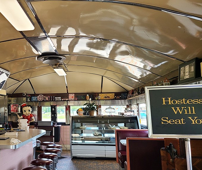 Step inside and the curved ceiling embraces you like a warm hug, while Betty Boop stands guard over decades of breakfast memories.