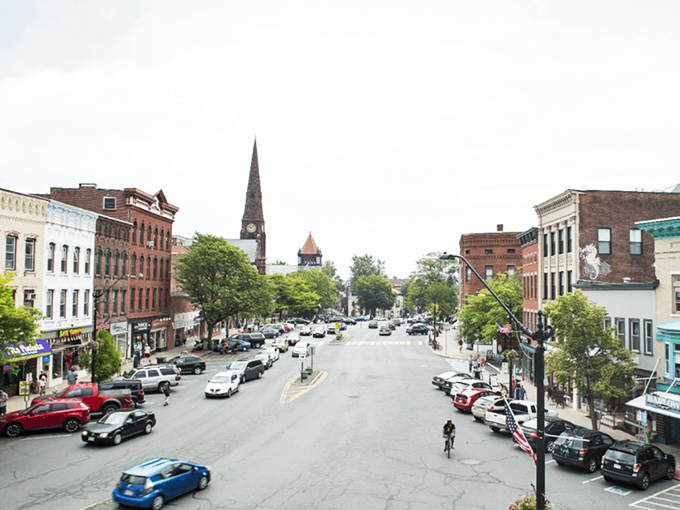 That church steeple rising above downtown Turners Falls like a friendly lighthouse guiding retirees to affordable living and actual parking spaces.