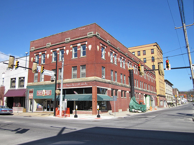 Main Street's brick buildings stand like sentinels of simpler times, when neighbors greeted each other and nobody rushed through lunch.