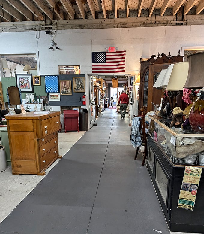Exposed beams and American flags create the perfect backdrop for discovering pieces of history tucked between antique furniture and vintage collectibles.