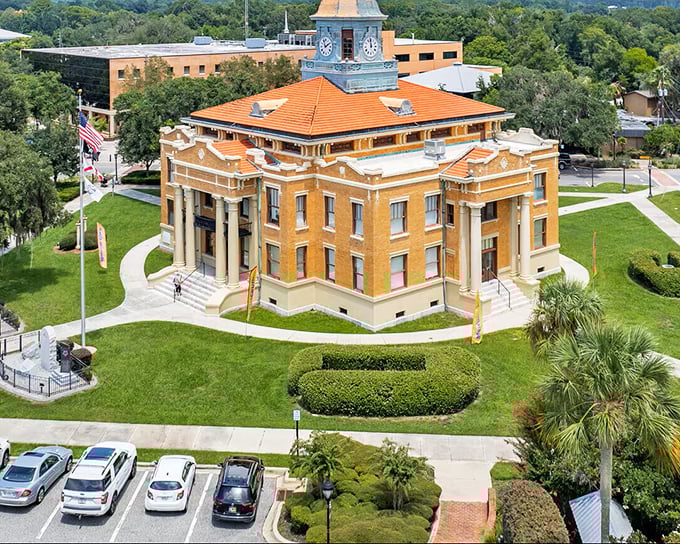 Stately columns and meticulous landscaping frame this architectural gem, where small-town governance meets Mediterranean Revival elegance without the South Beach price tag.