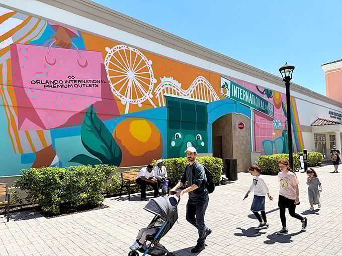 This vibrant mural serves as both Instagram backdrop and shopping motivation&mdash;because nothing says "retail therapy" quite like a wall reminding you of all the shopping bags you haven't filled yet.