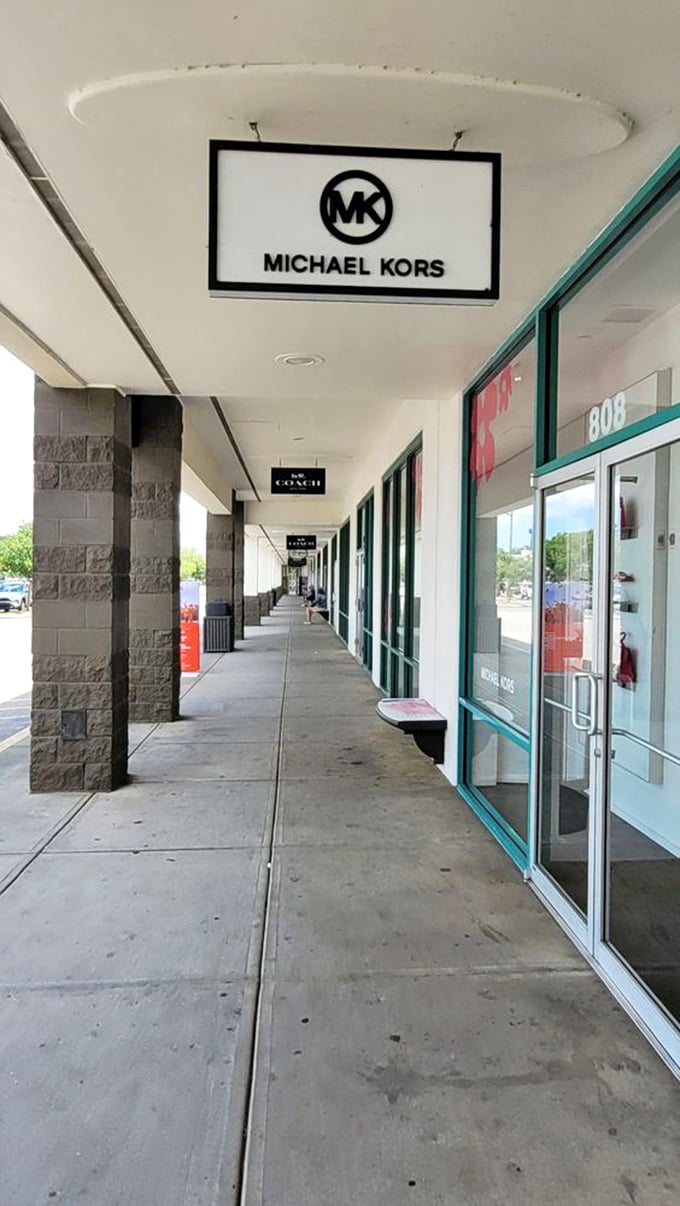 The covered walkways offer blessed shade during Florida's merciless summer heat, turning what could be a sweaty shopping marathon into a civilized pursuit.