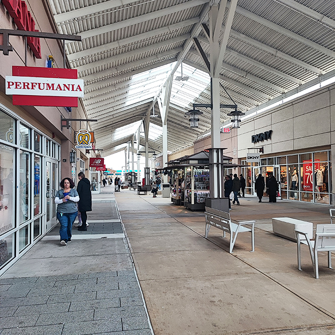 Covered walkways mean your deal-hunting continues rain or shine. Shopping perseverance deserves architectural support!