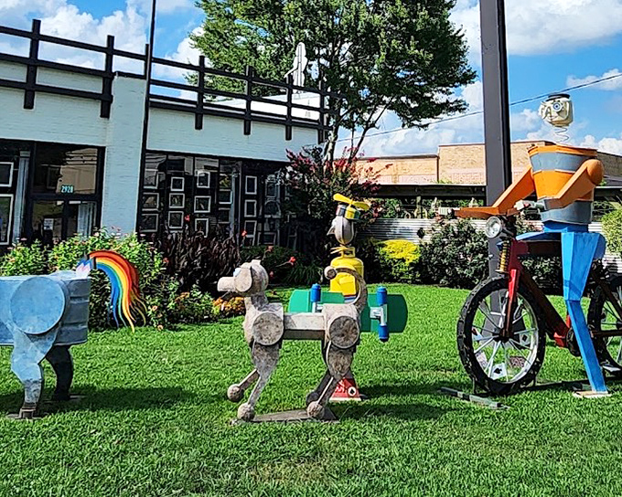 The front lawn doubles as an outdoor sculpture garden where colorful metal creatures seem ready to spring to life when nobody's looking.