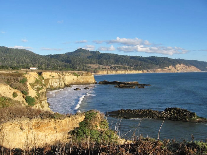 Golden cliffs meet azure waters in a geological masterpiece that would make even the most jaded traveler stop and stare.