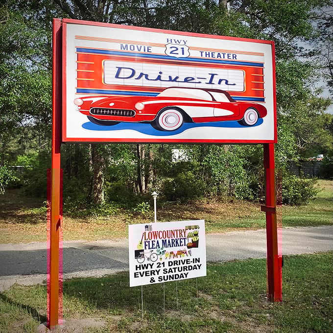 This retro sign isn't just advertising&mdash;it's a portal to simpler times. The classic car silhouette promises nostalgic entertainment ahead.